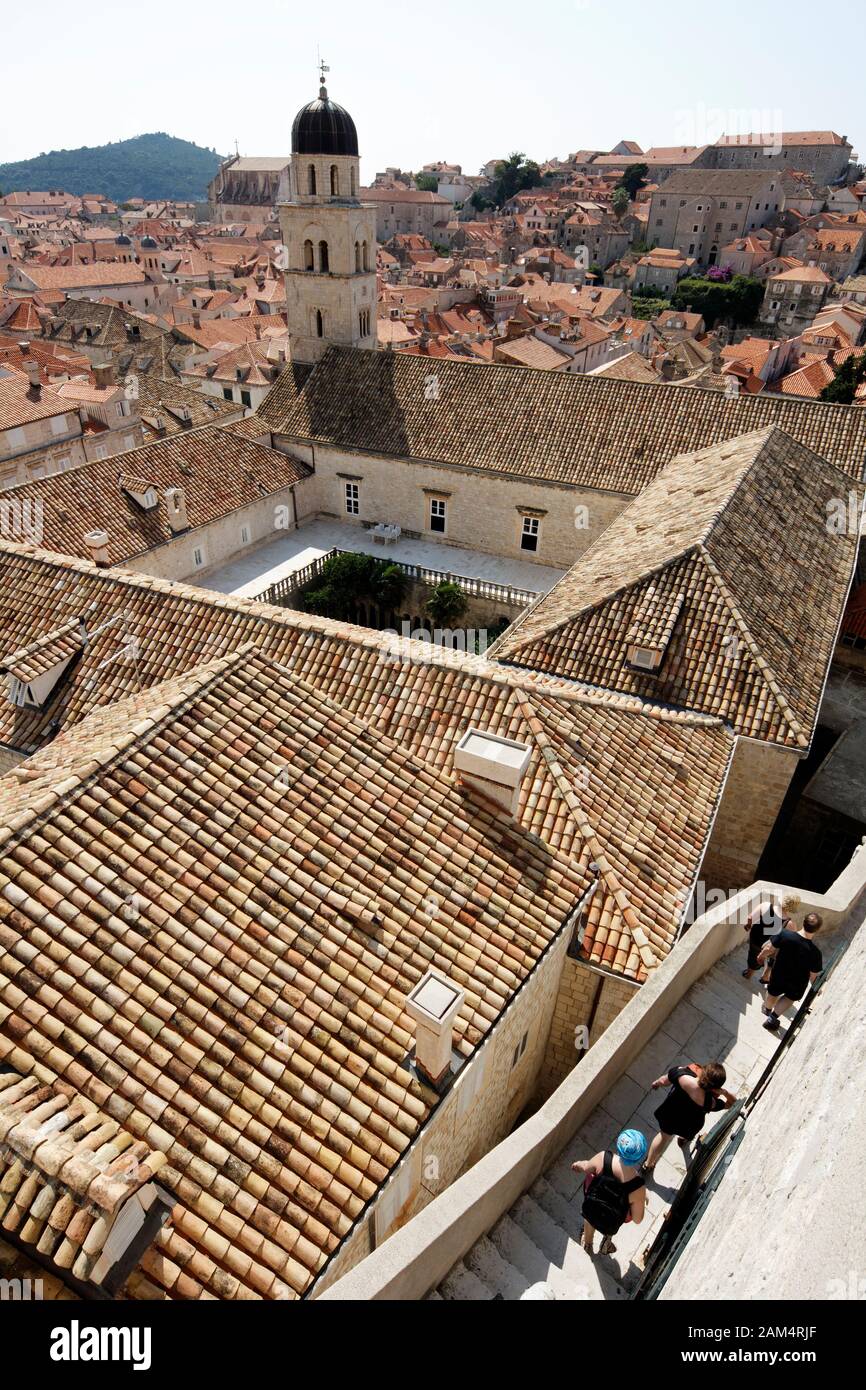 Tourists at city Wall, Franciscan monastery tower, Dubrovnik, Croatia ...