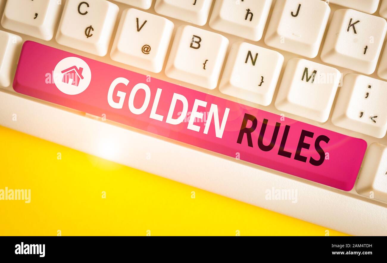 Writing note showing Golden Rules. Business concept for basic principle that should always ...