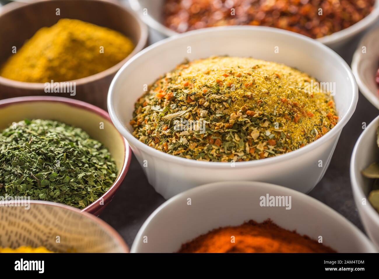 Vegeta and variety spices and herbs in bowls. Dry vegetable with salt ...