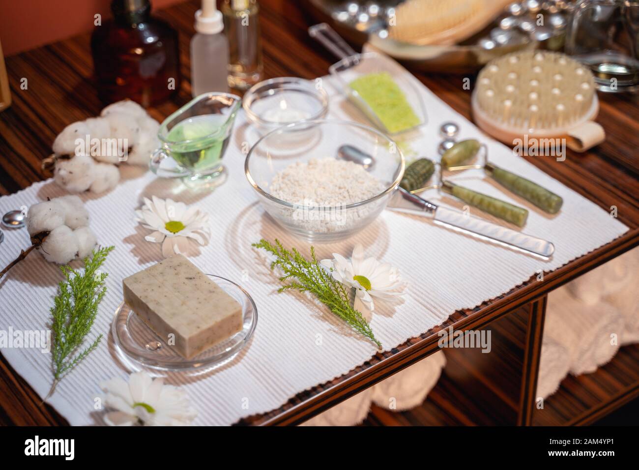 Skin care products resting on a bathroom countertop Stock Photo - Alamy