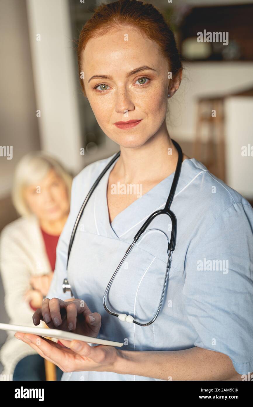 Portrait of kind doctor that looking at camera Stock Photo - Alamy