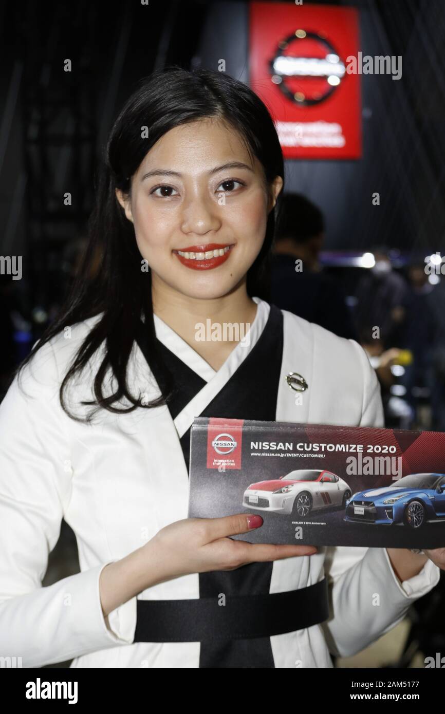 Chiba, Japan. 11th Jan, 2020. A booth assistant poses for a photograph ...