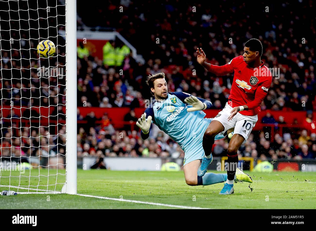 Manchester United's Marcus Rashford scores his side's first goal of the ...