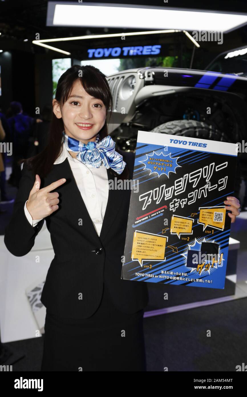 Chiba, Japan. 11th Jan, 2020. A booth assistant poses for a photograph ...