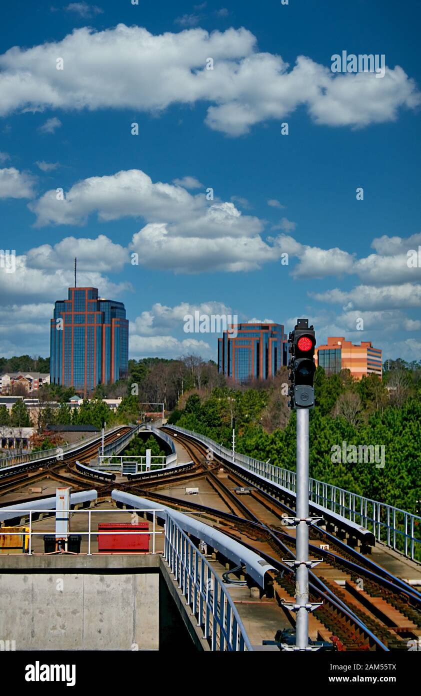 Rapid transit rail tracks running above ground from station Stock Photo ...