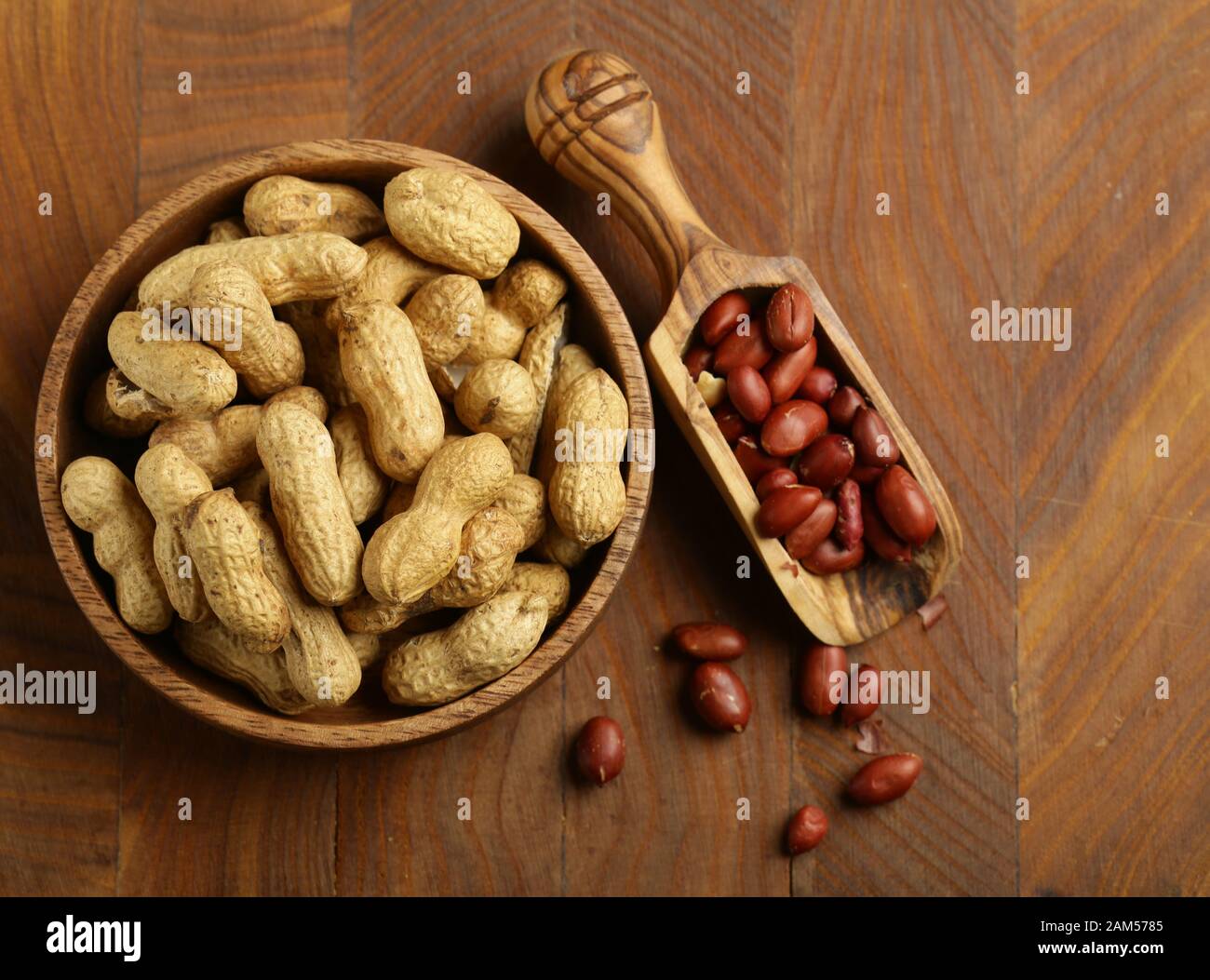 Peanuts in red shell hi-res stock photography and images - Alamy