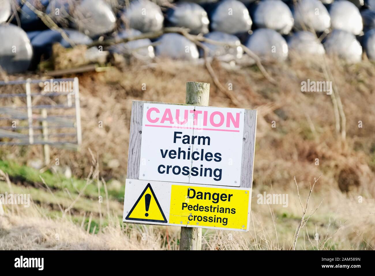 Farm vehicles and tractors crossing danger and warning sign Stock Photo ...