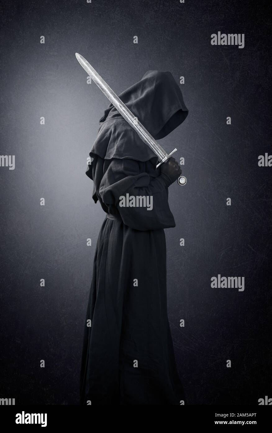 Ghostly figure with medieval sword in the dark with clipping path Stock ...