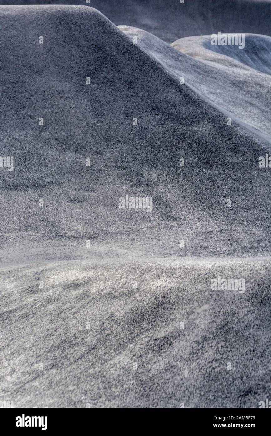 Sloping ramp surface of a skatepark / skateboard park. Metaphor incline ...