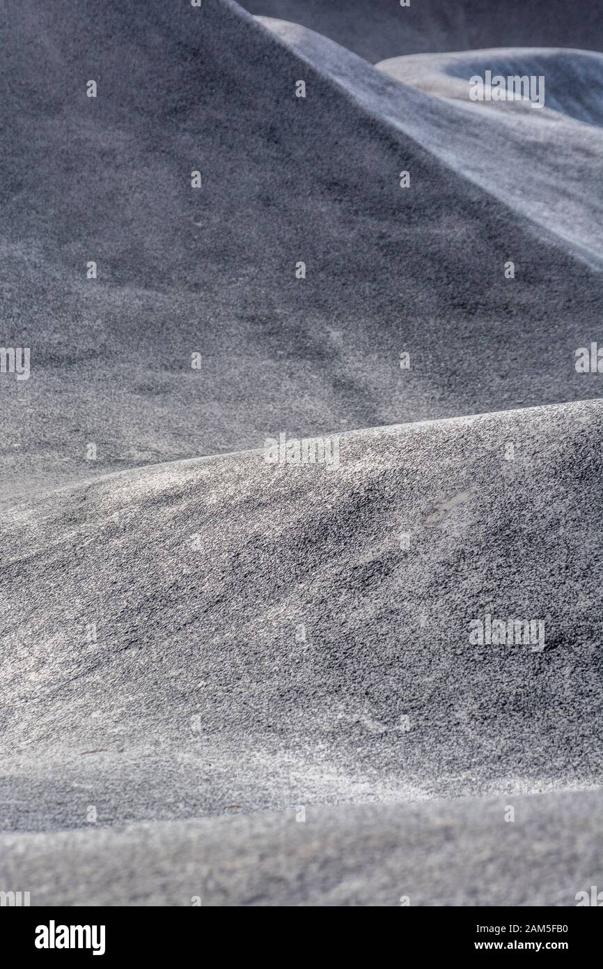 Sloping ramp surface of a skatepark / skateboard park. Metaphor incline ...