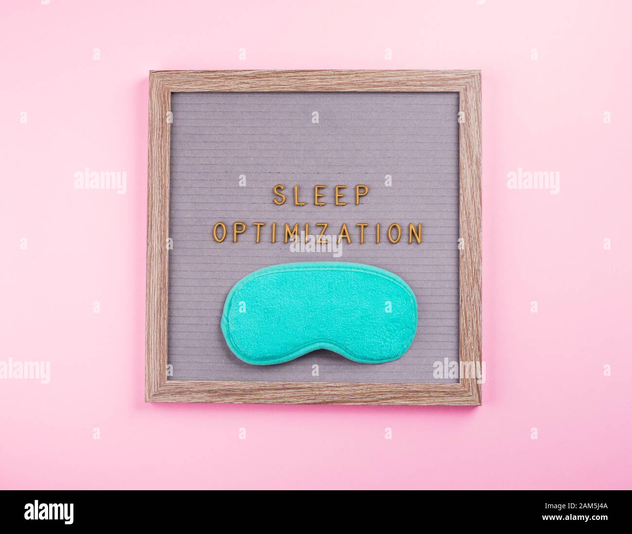 Sleep optimization text on letter board with mask Stock Photo - Alamy
