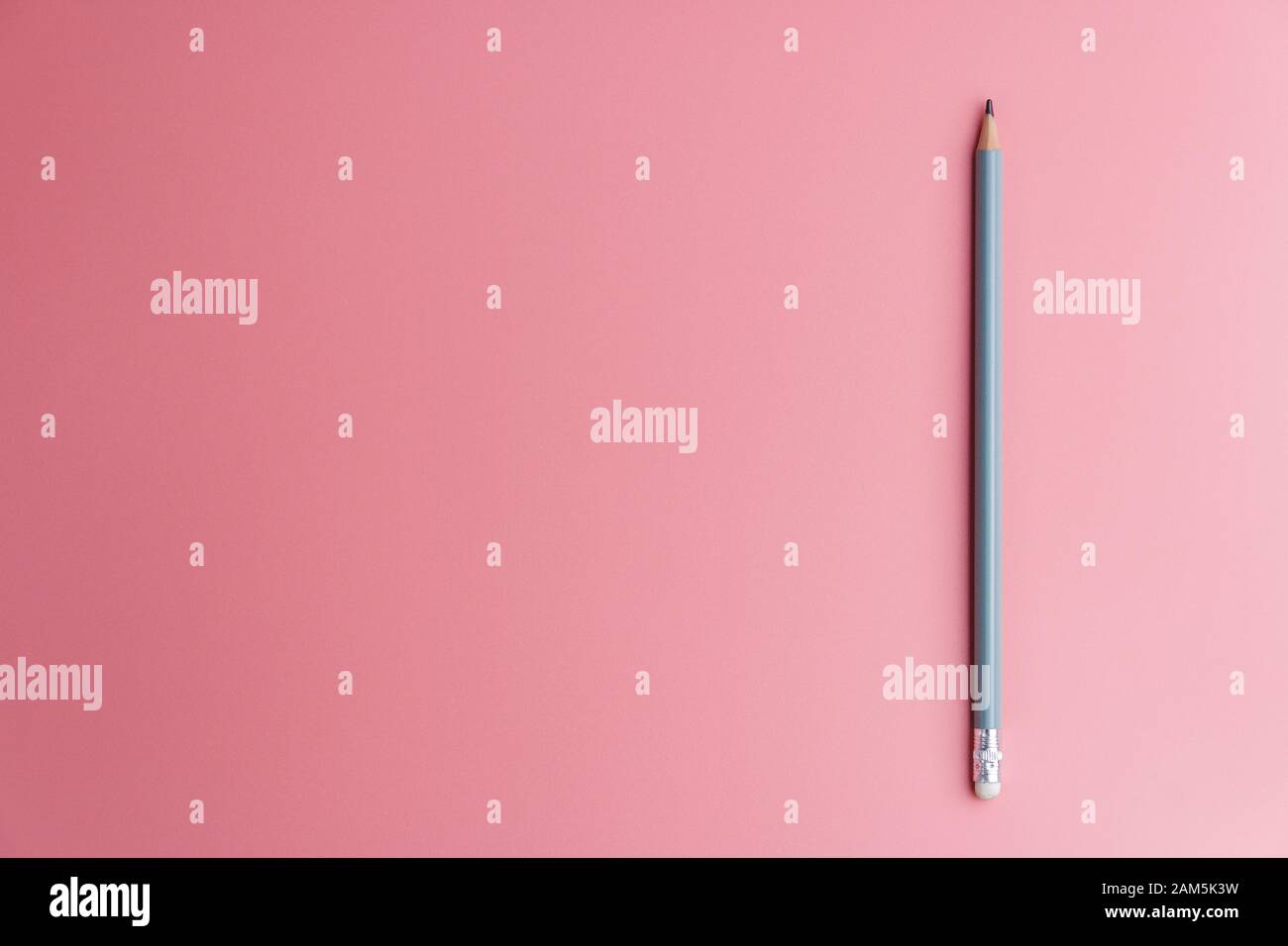 one pencil on a red background. minimal workspace for designs Stock ...