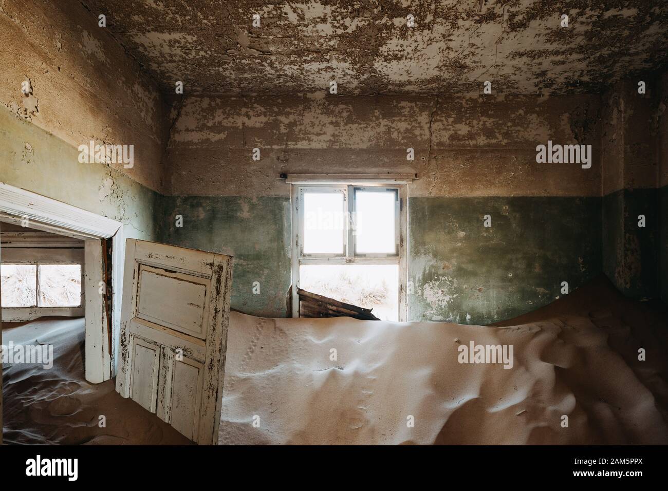 desert sand has invaded and taken over these rooms in Kolmanskoppe ...