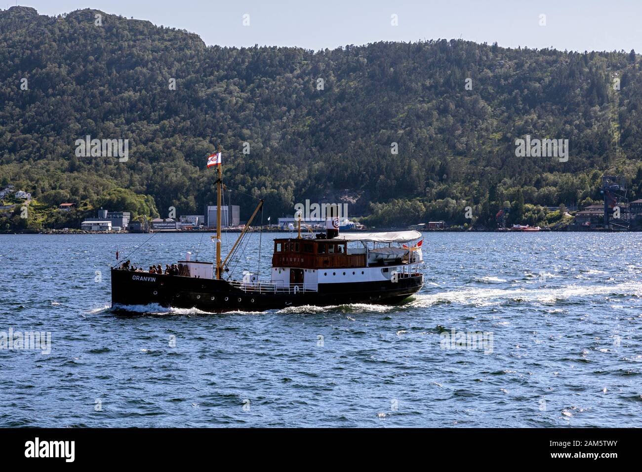 Veteran passenger steam ship Granvin, built 1931. Passing Gravdal ...