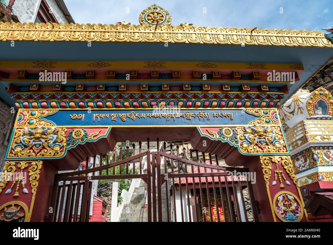 Entrance gate to Buddhist monastery in Marpha, a small village in ...