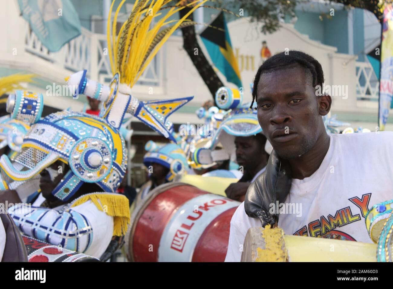 Man playing a homemade goatskin drum at the Junkanoo festival ...