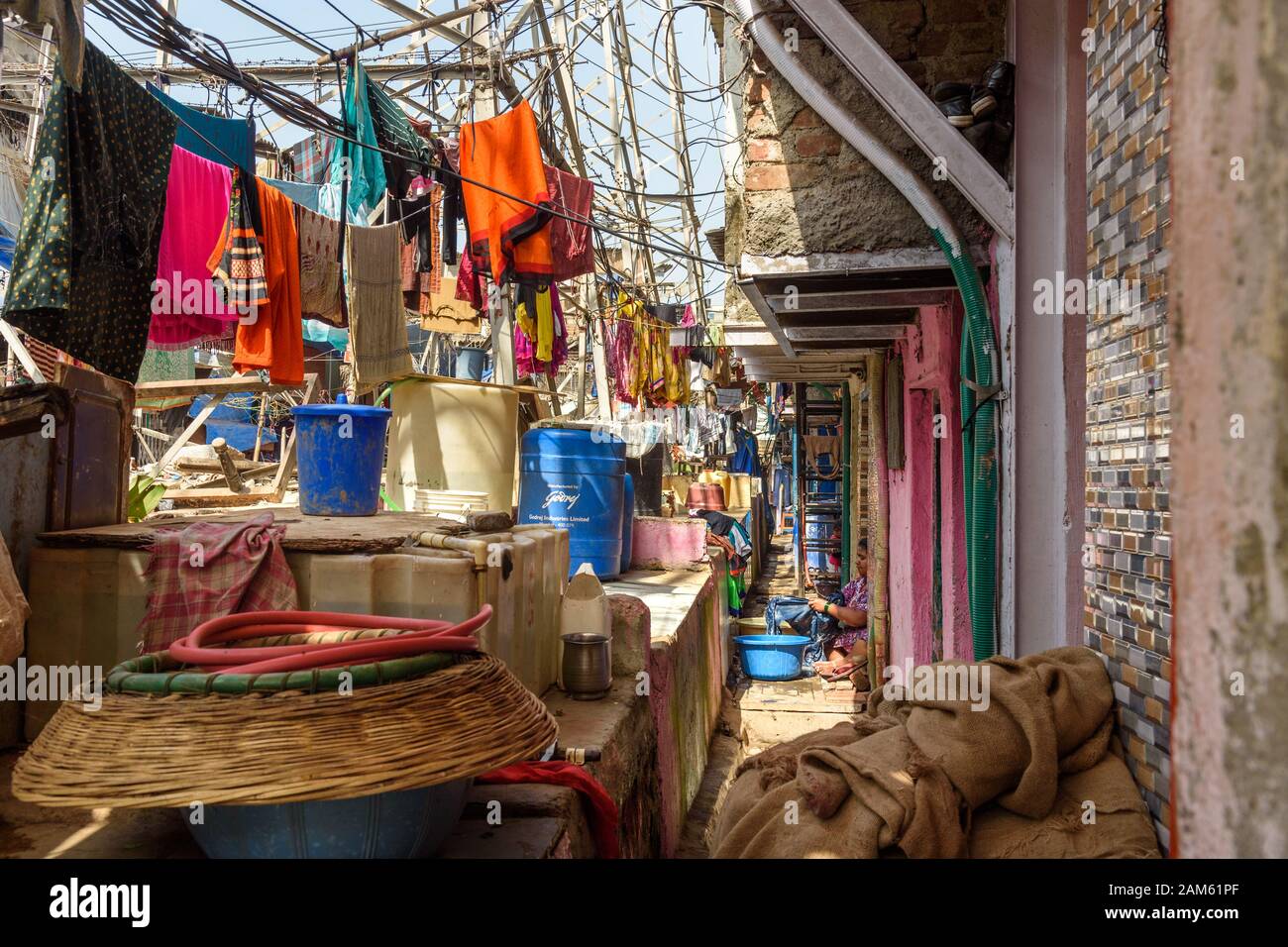 On the narrow street in Dharavi Slum at Mumbai. India Stock Photo - Alamy