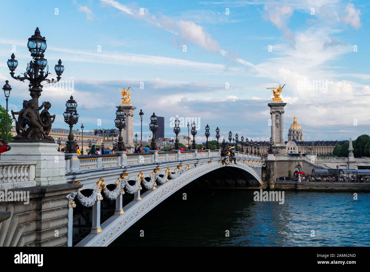 Paris landmark - famouse Alexandre III Bridge over Seine under blue sky ...