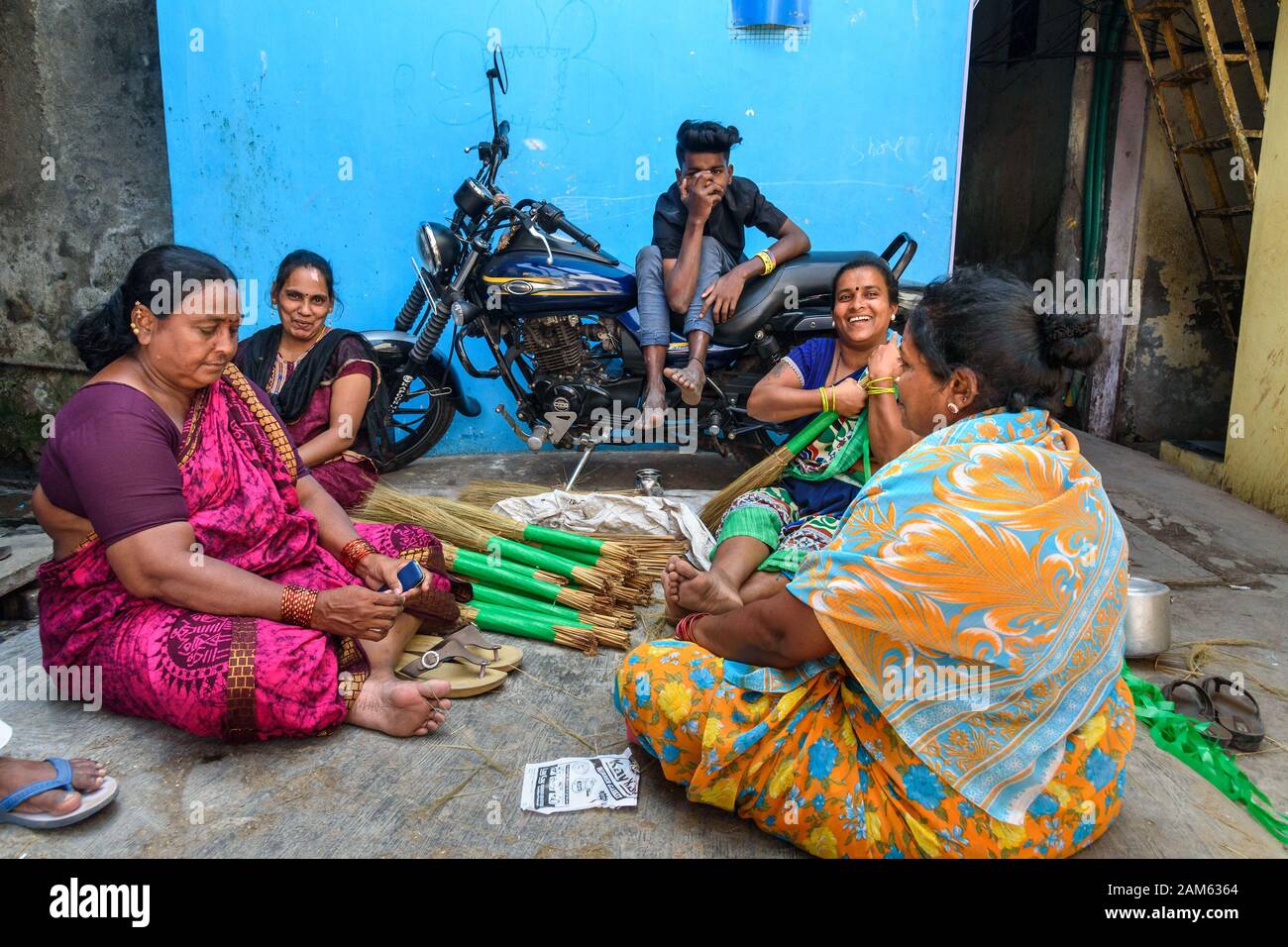 Indian women making brooms in Dharavi Slum at Mumbai. India Stock Photo ...