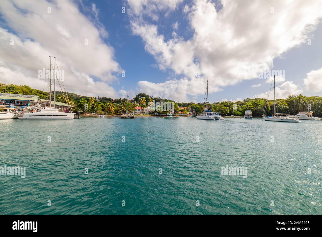 View of Canash beach and boats on mooring in Blue Lagoon, Saint Vincent ...