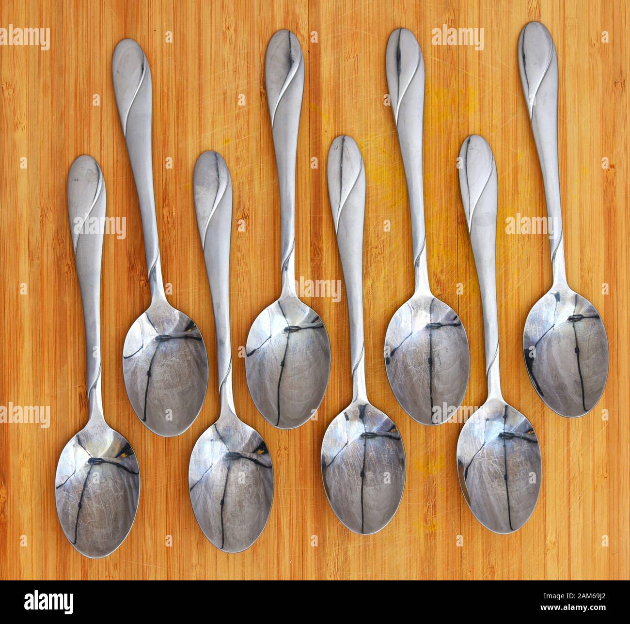 Reflective spoons hi-res stock photography and images - Alamy
