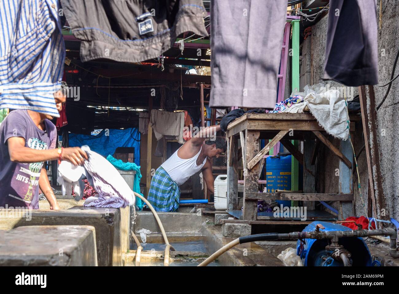 Traditional indian street laundry man hi-res stock photography and ...