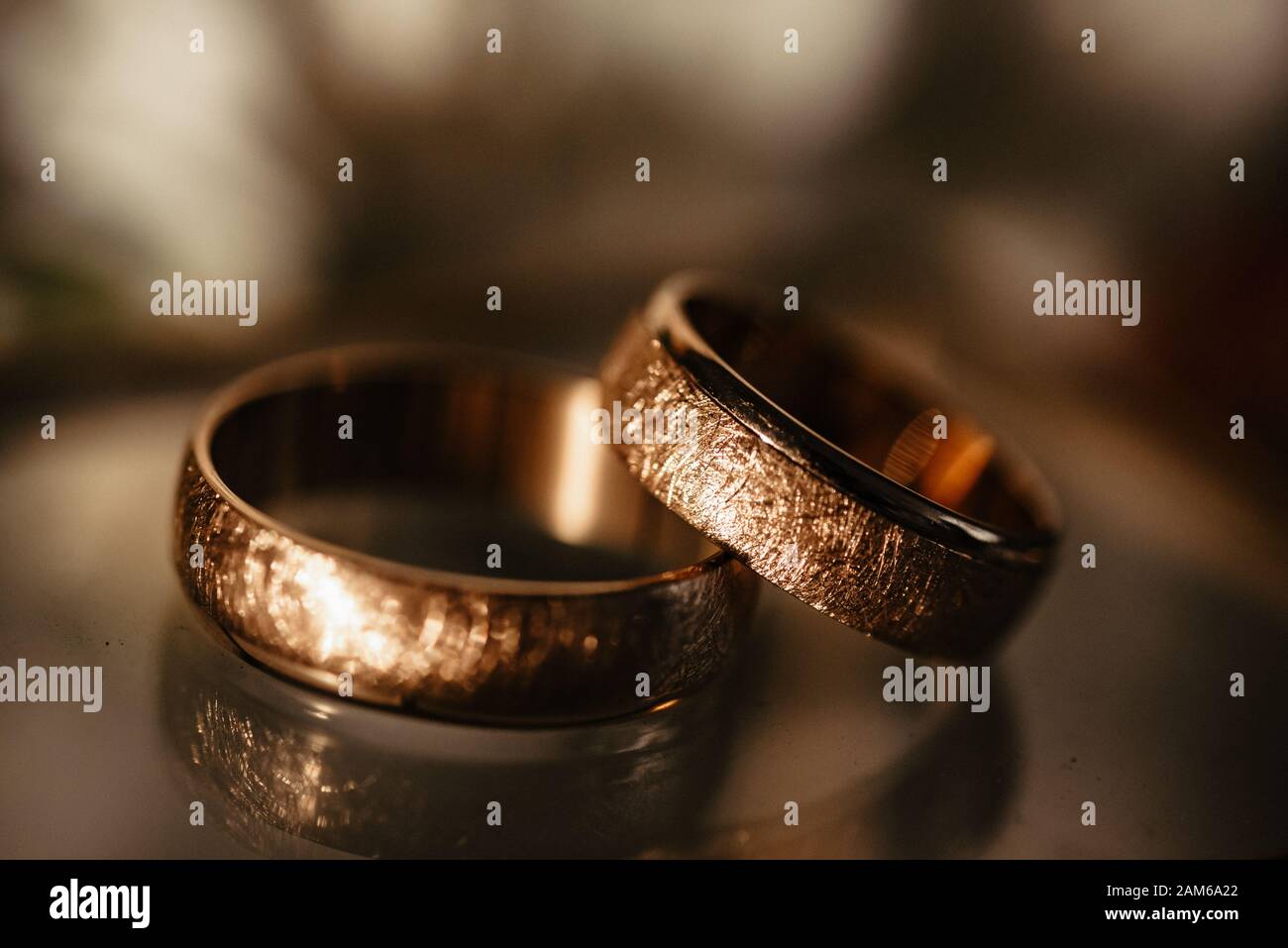 Golden wedding rings, wedding details Stock Photo - Alamy