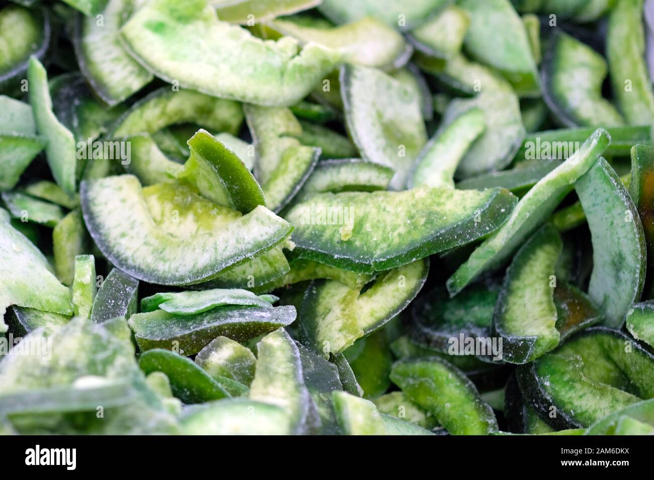 Dried pomelo slices top view. Green slices pomelo candied fruits ...