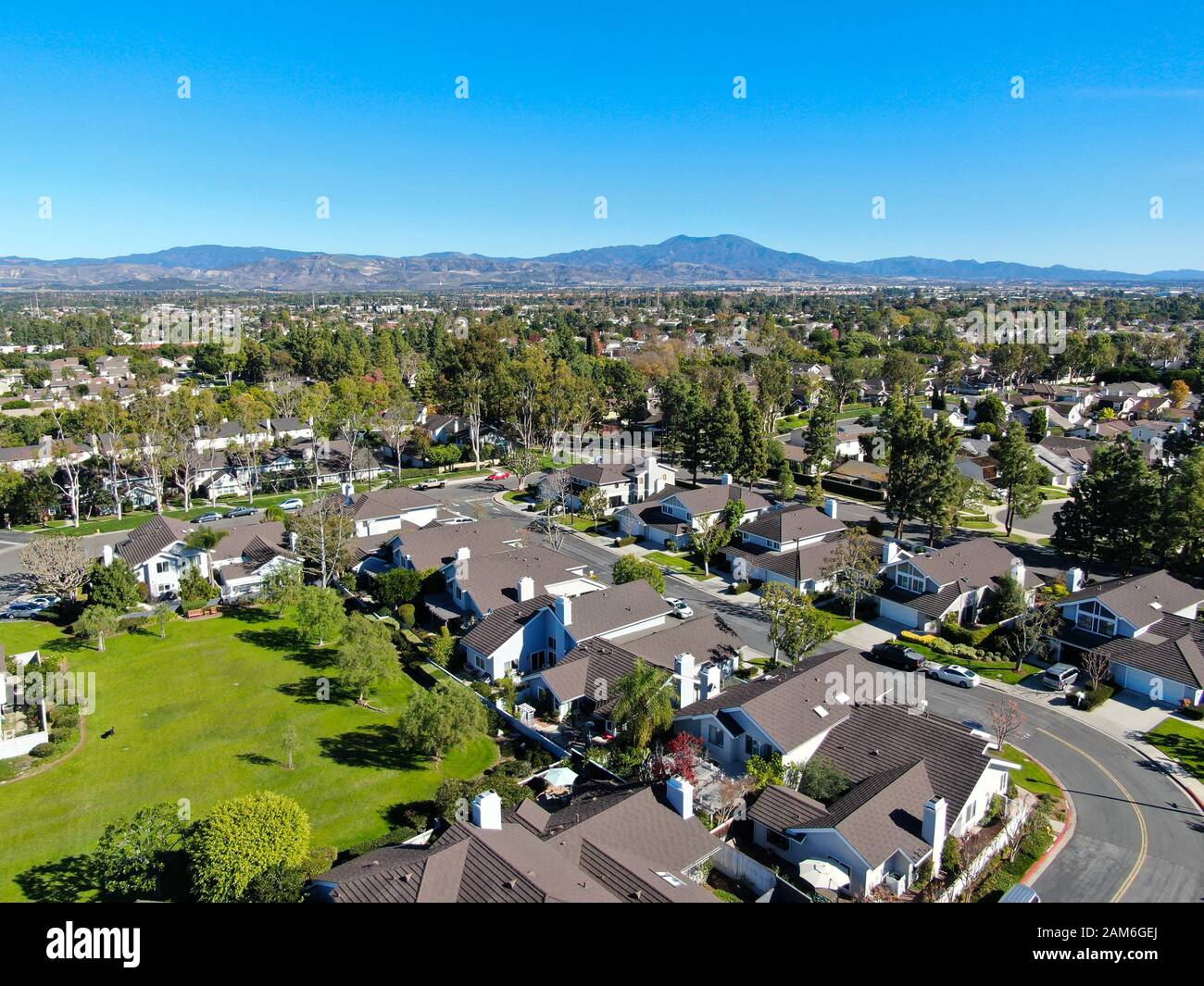 Aerial view of residential suburban packed homes neighborhood during ...
