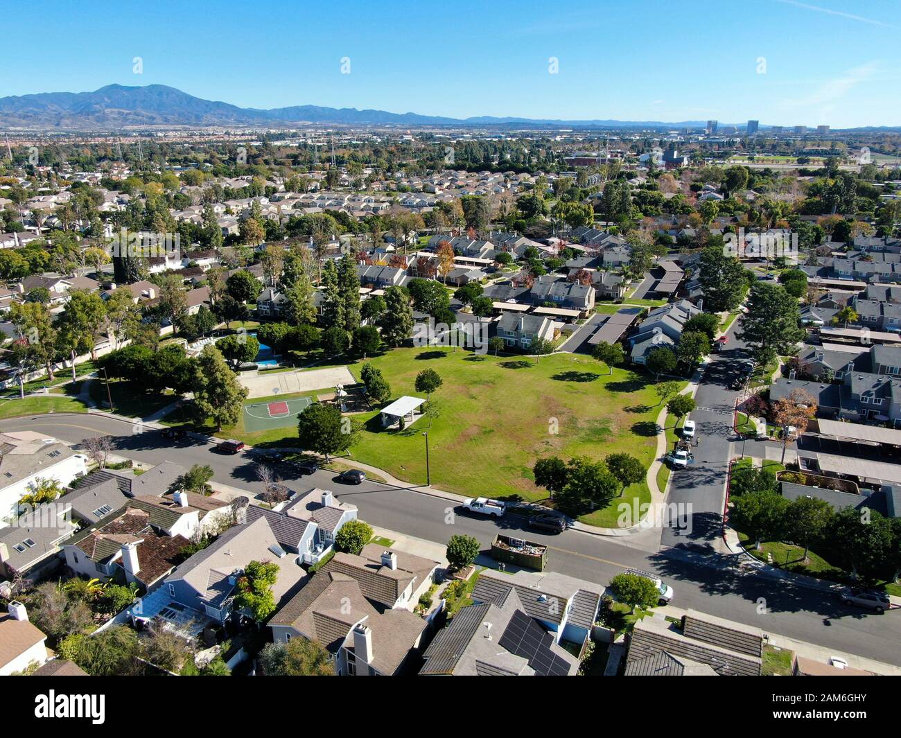Aerial view of residential suburban packed homes neighborhood during ...