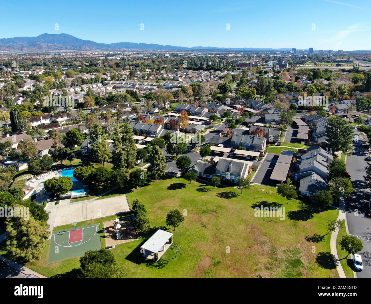 Aerial view of residential suburban packed homes neighborhood during ...