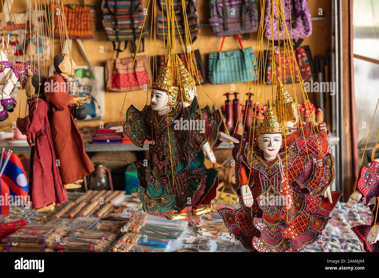 LUANG PRABANG, LAOS - OCTOBER 10, 2019: Traditional fabric decorative ...
