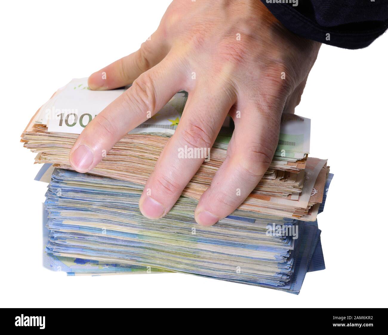 hand of a man grabbing a huge pile of european money banknotes on a ...