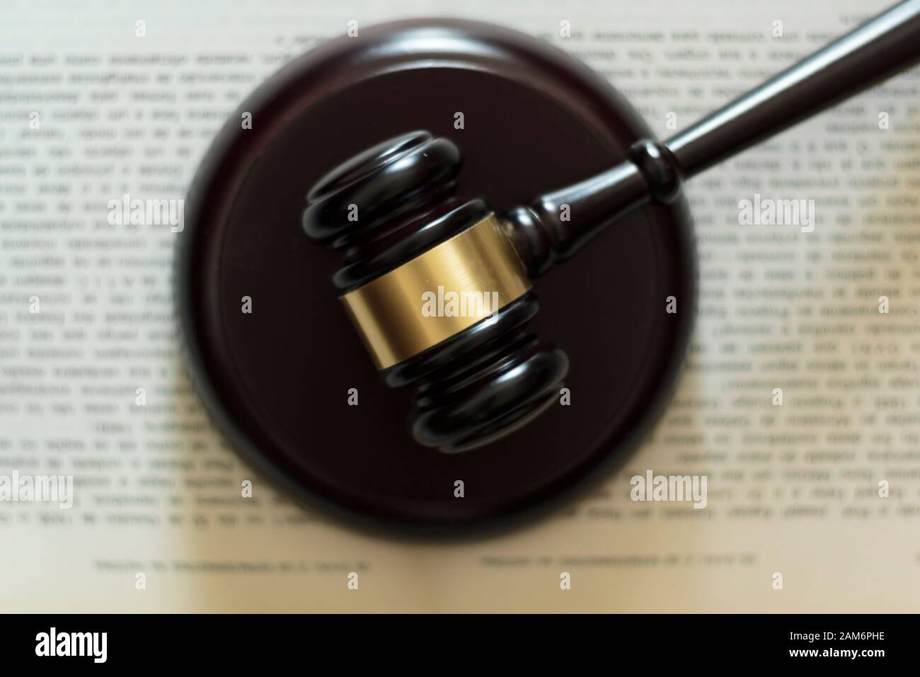 Top view of Judge's gavel on top of open book Stock Photo - Alamy