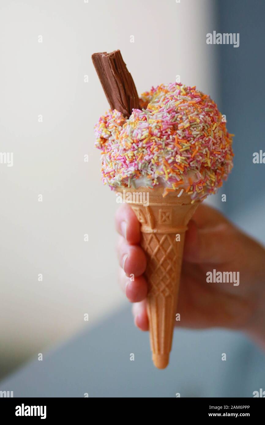 Multi coloured ice cream cone hi-res stock photography and images - Alamy