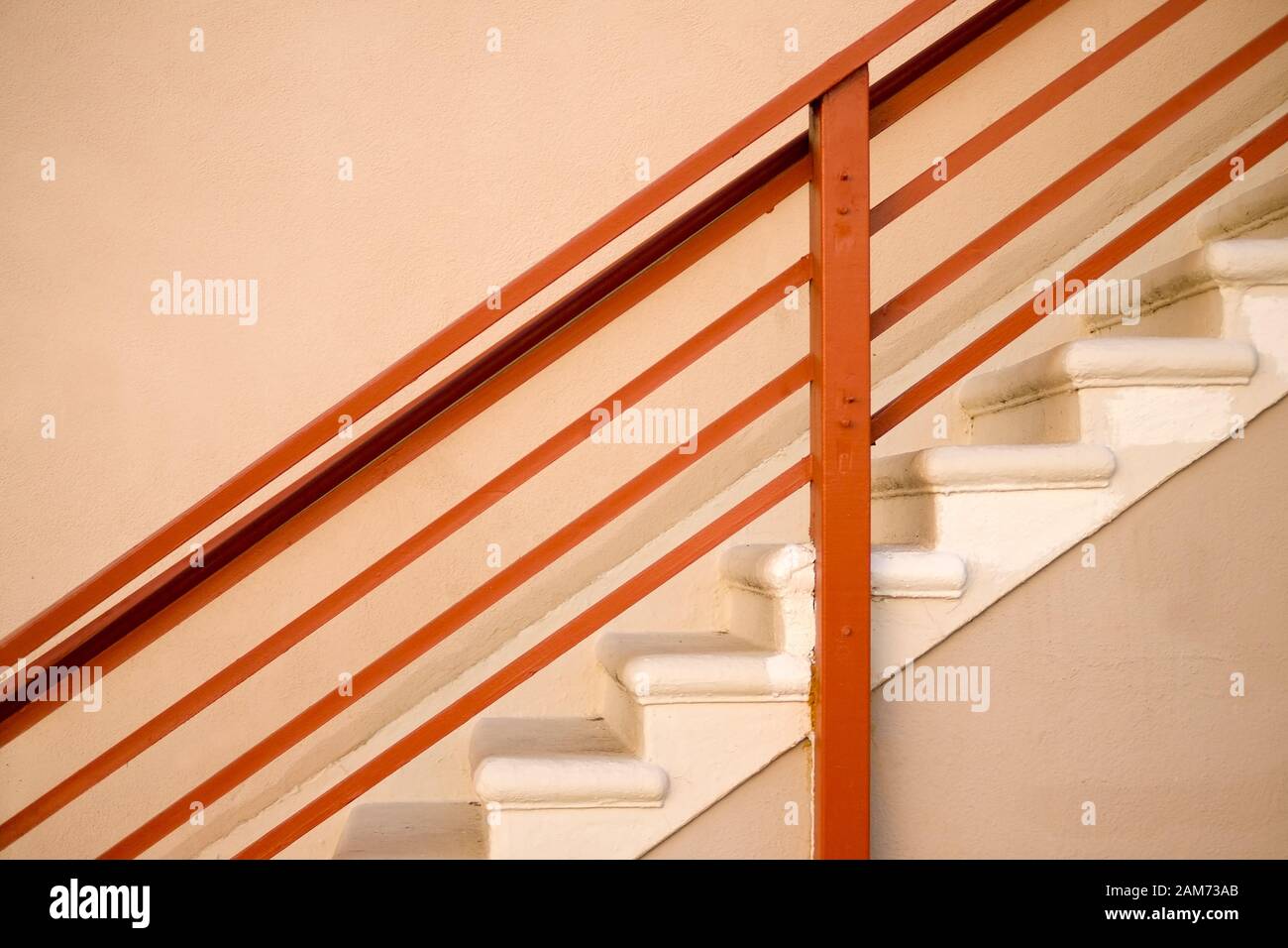 White staircase, orange railings, tan wall Venice Bech California USA ...