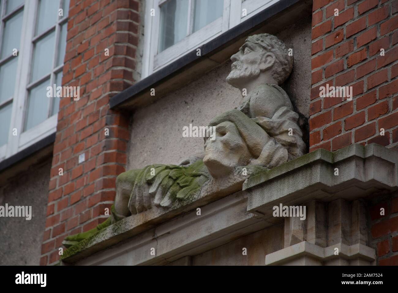 Reclining male figure hi-res stock photography and images - Alamy