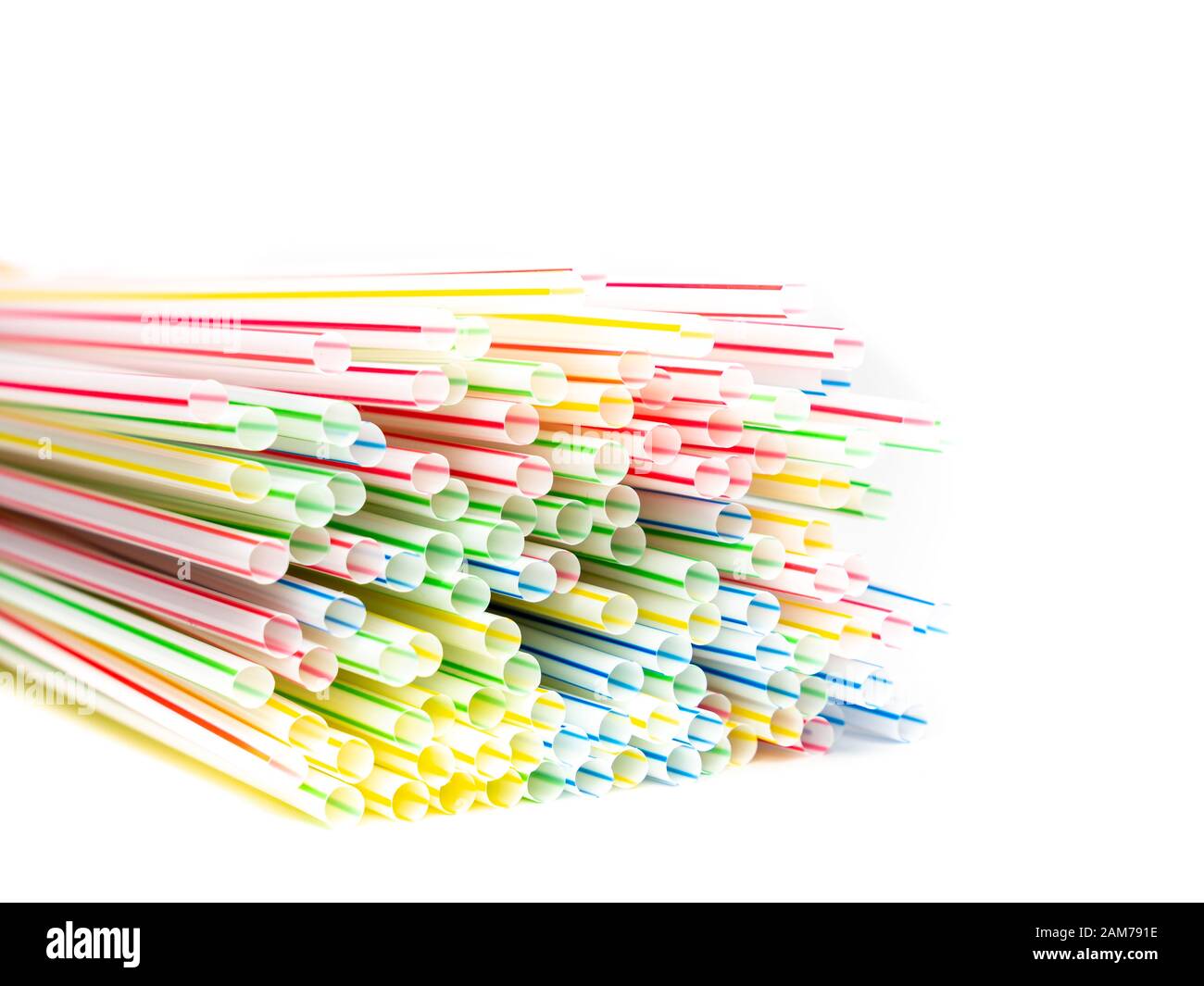 Many plastic straws isolated on white background Stock Photo - Alamy