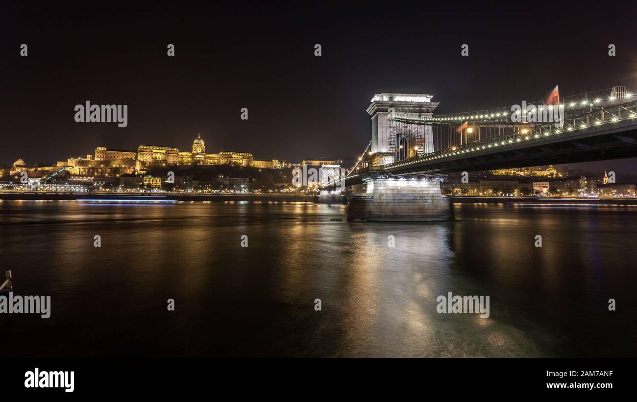 Szechenyi Chain Bridge on the Danube river at night. Budapest, Hungary ...