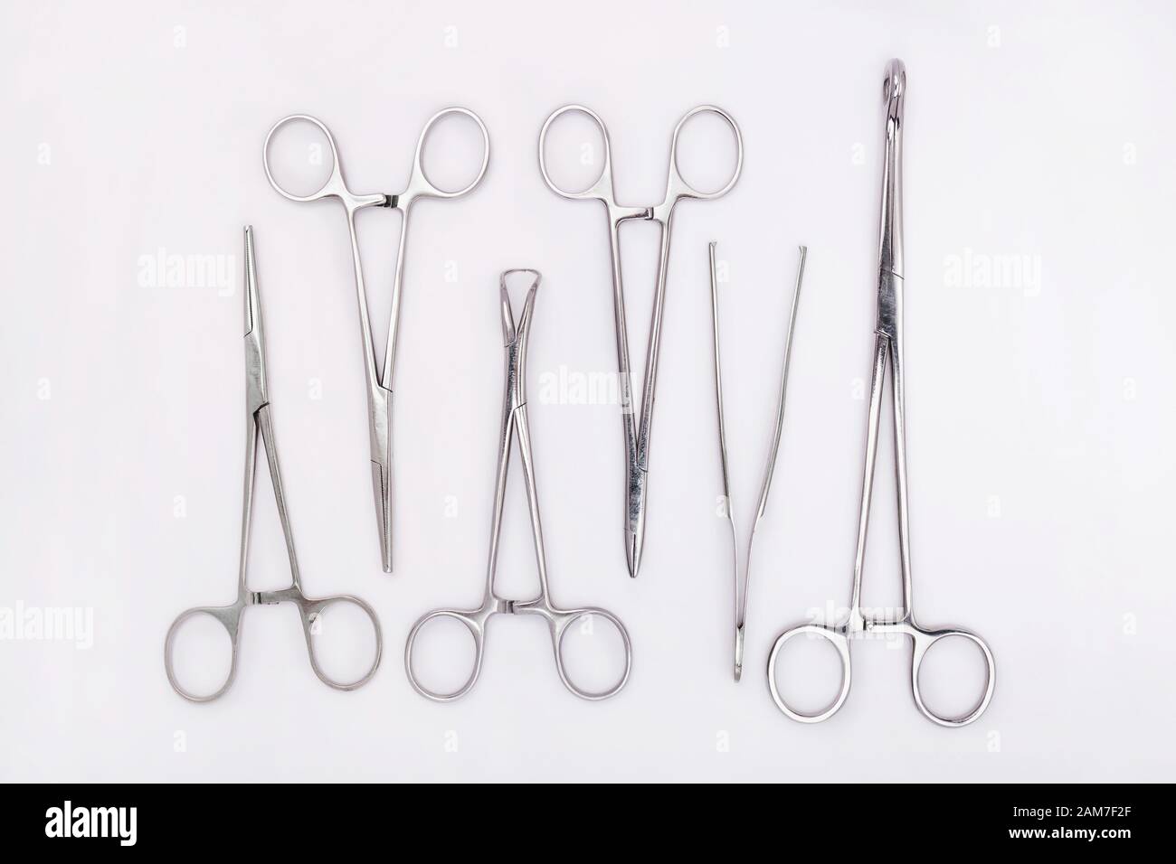 Set of surgical instruments on white background. Flat lay Stock Photo ...