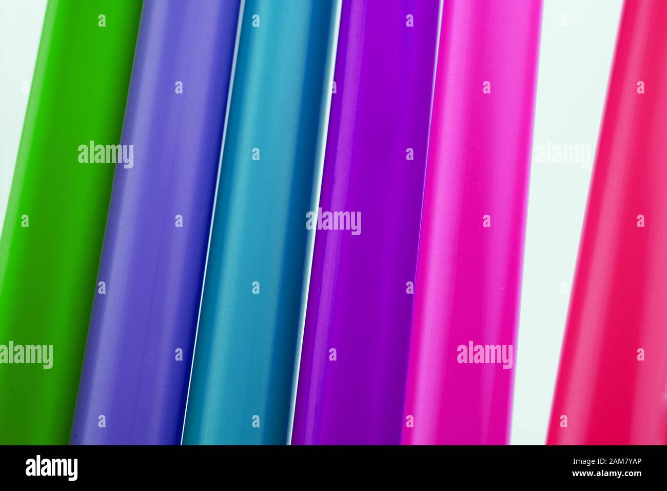 different color of straw on a white background Stock Photo - Alamy