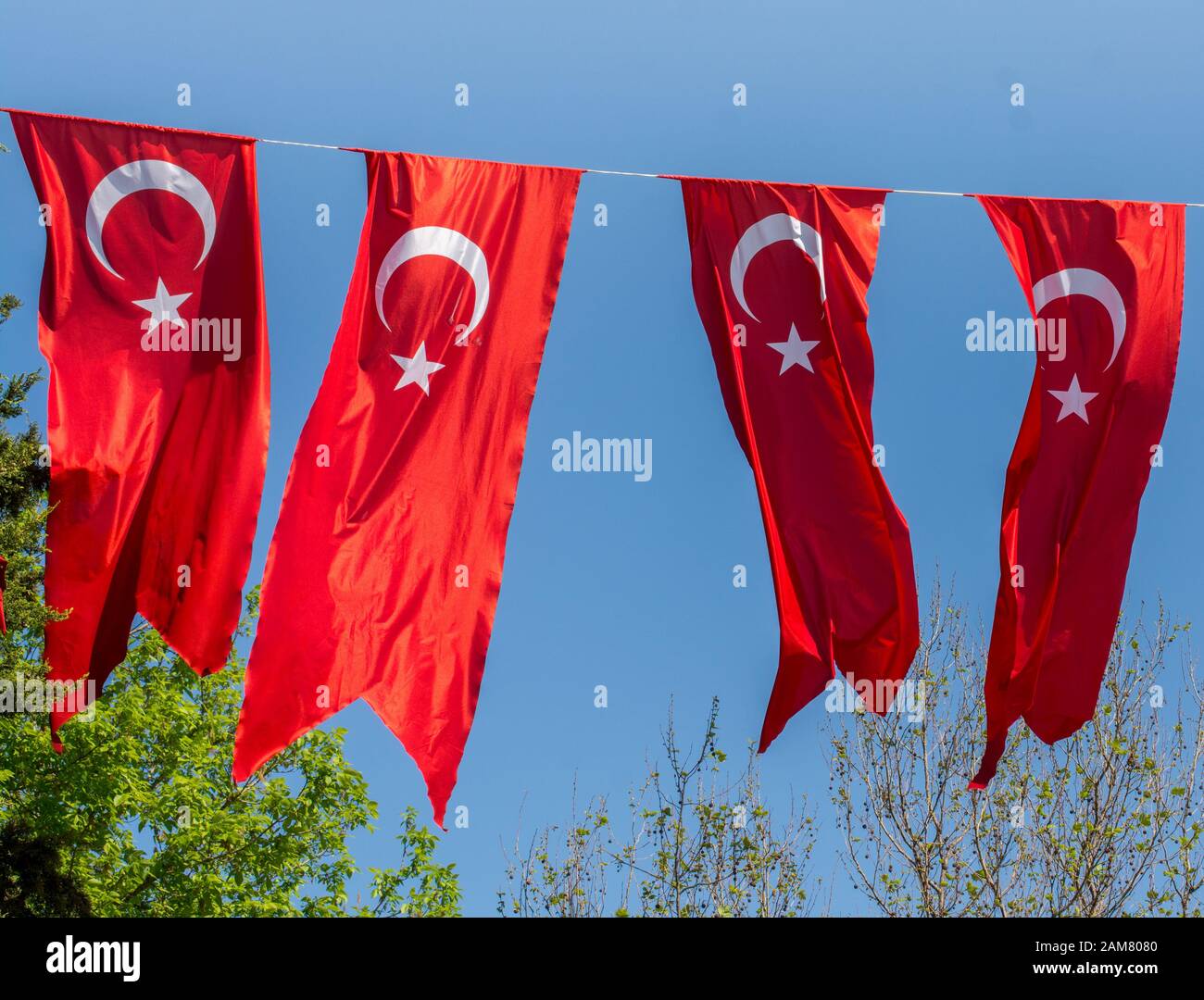 Turkish national flags hang in view in open air Stock Photo - Alamy