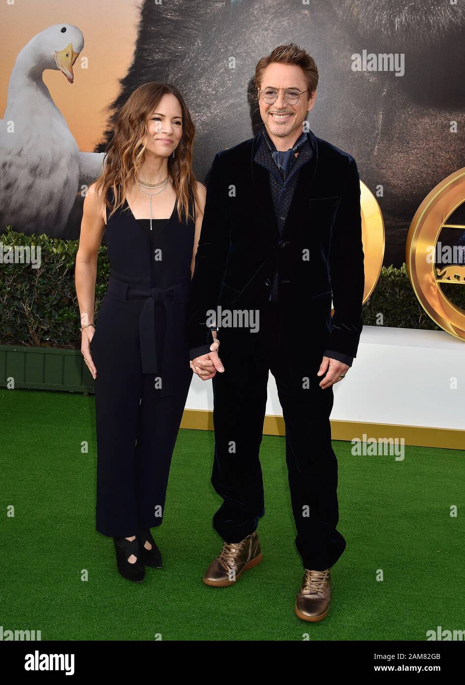 WESTWOOD, CA - JANUARY 11: Robert Downey Jr. (R) and Susan Downey ...