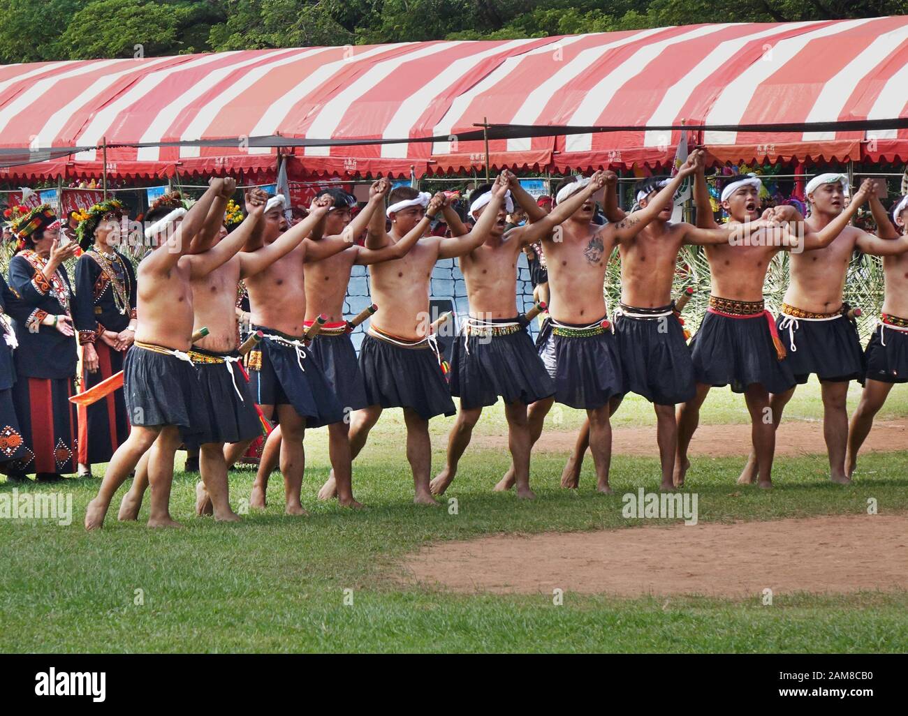 KAOHSIUNG, TAIWAN -- SEPTEMBER 28, 2019: Young men of the indigenous ...