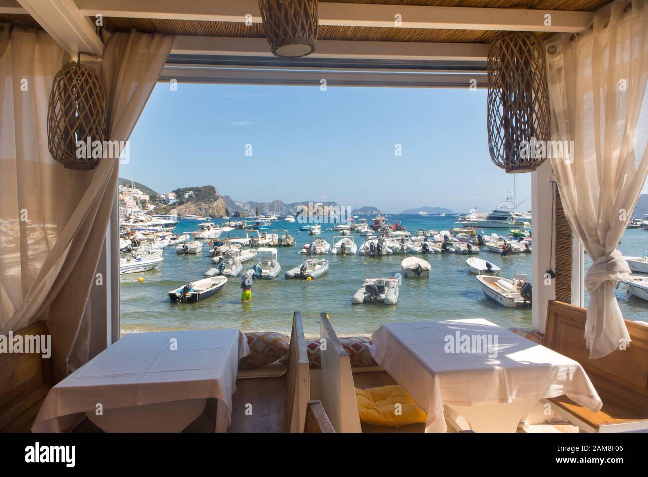 Boats anchored in an Italian harbor Stock Photo - Alamy