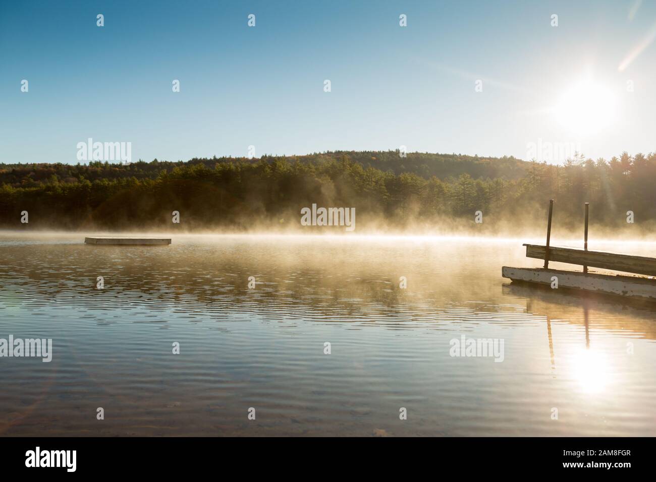 Steam rises off the lake Stock Photo - Alamy