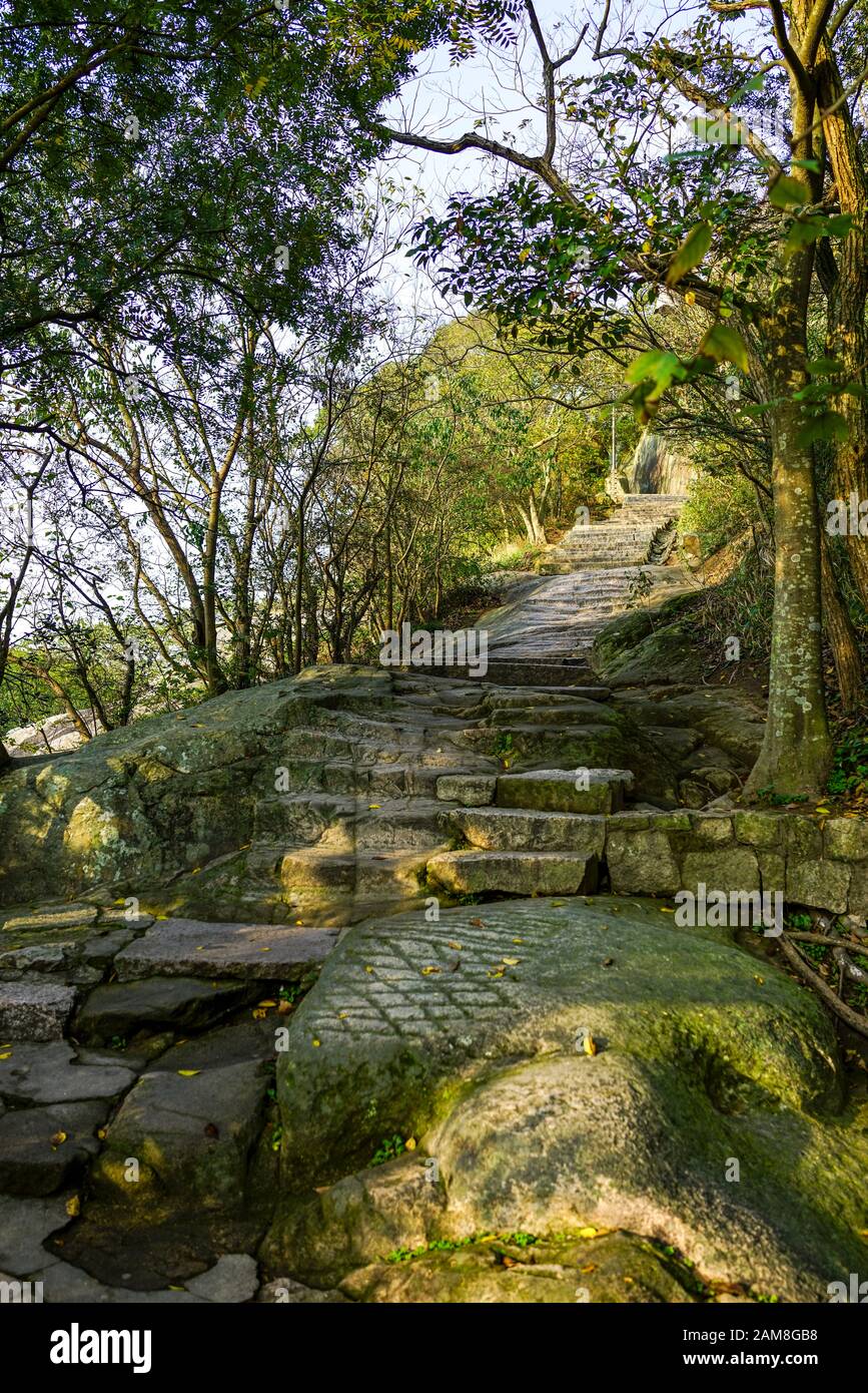 The stone stairs leads to the Xitian scenic area of Mount Putuo, is an ...