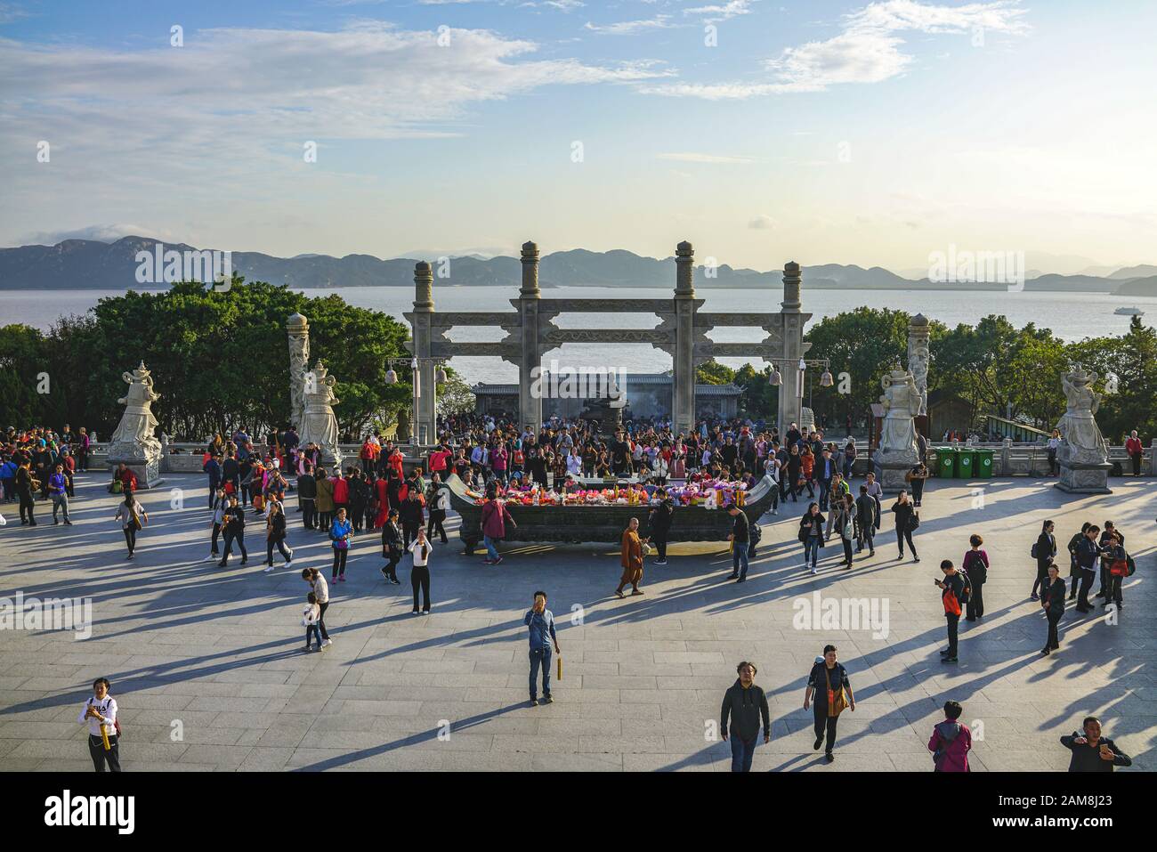 Zhejiang, China, November, 2018. A stone torii at Mount Putuo, is an ...