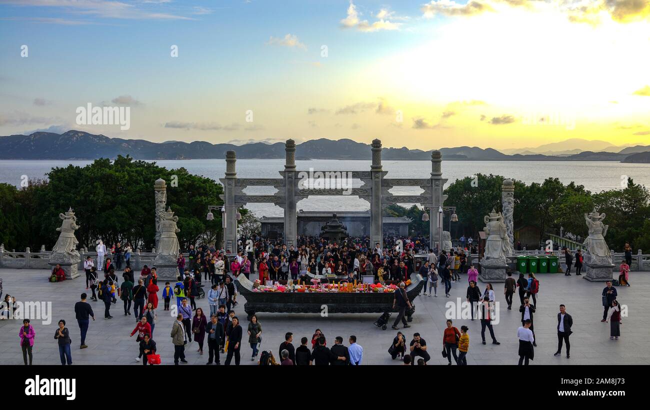 Zhejiang, China, November, 2018. A stone torii at Mount Putuo, is an ...
