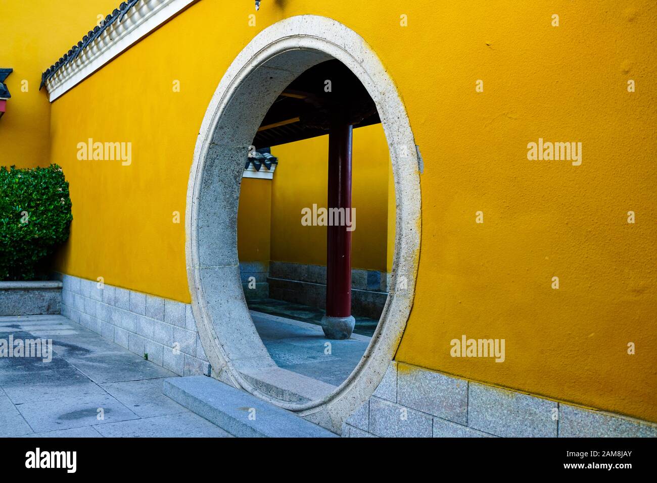 Zhejiang, China, November, 2018. A circle stone entrance to the temple ...